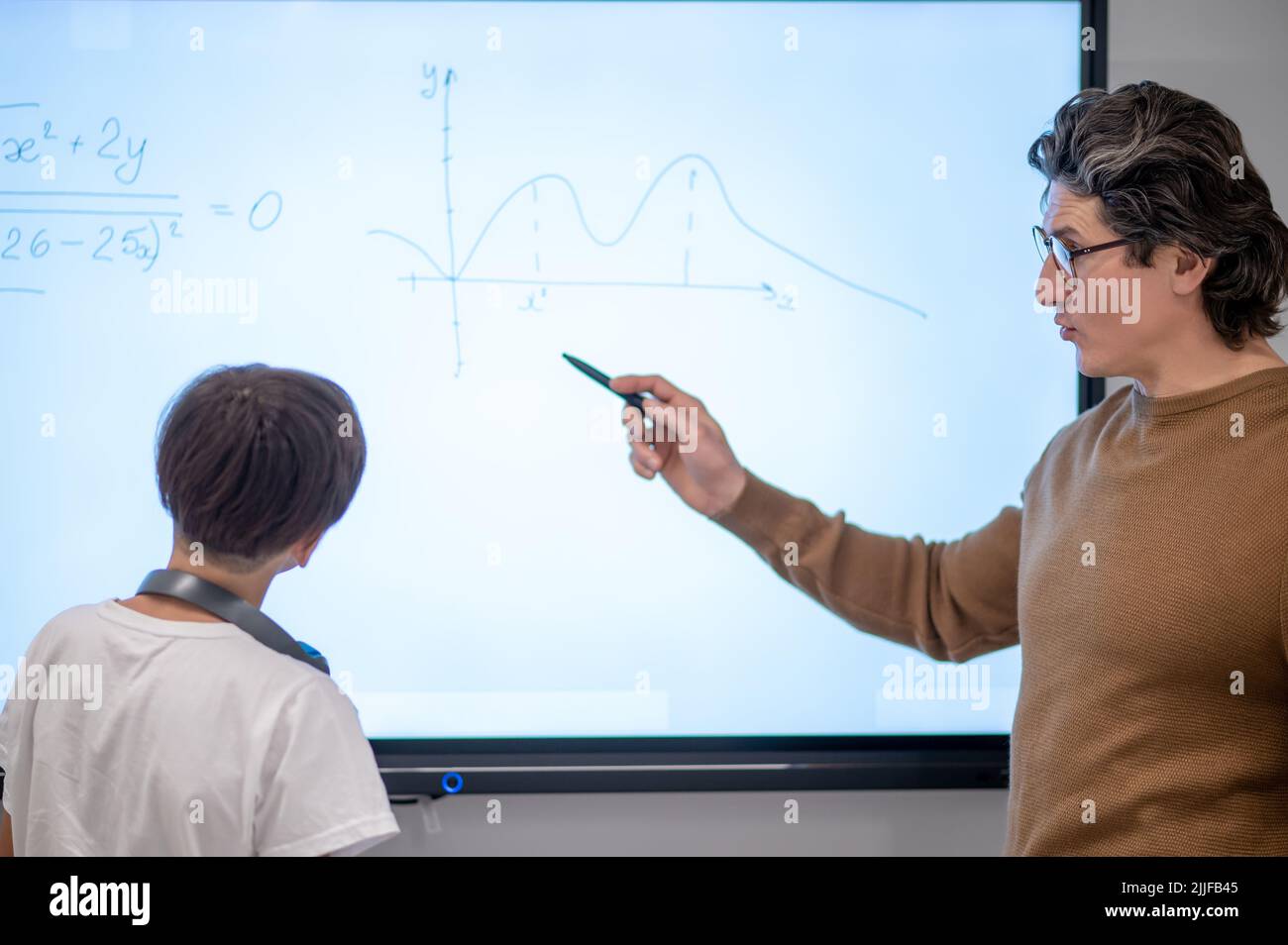 Maths lesson hi-res stock photography and images - Alamy