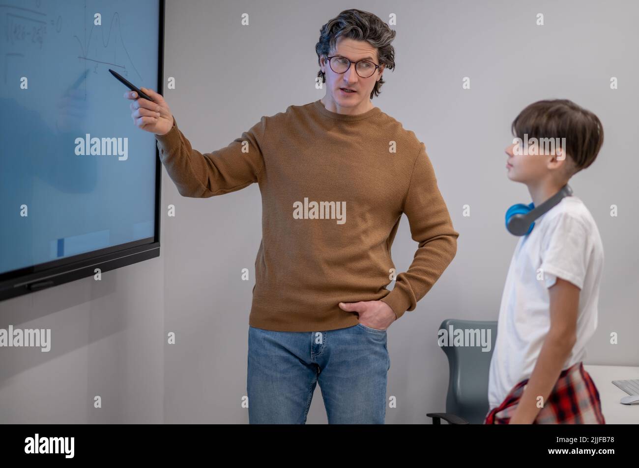 Maths lesson hi-res stock photography and images - Alamy