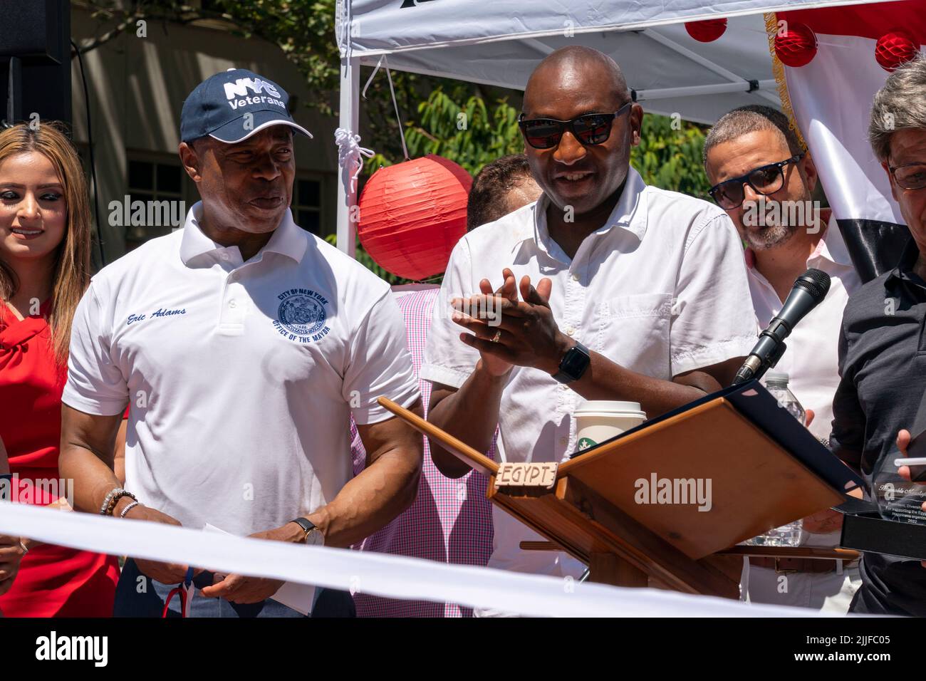 New York City Mayor Eric Adams cuts a ribbon during an Egyptian ...