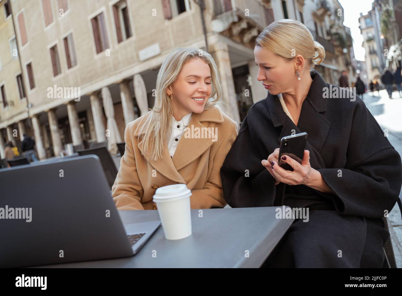 Two women serious conversation hi-res stock photography and images - Alamy