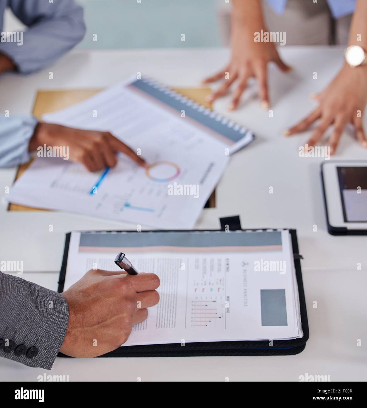 Businessman looking sales report hi-res stock photography and images ...