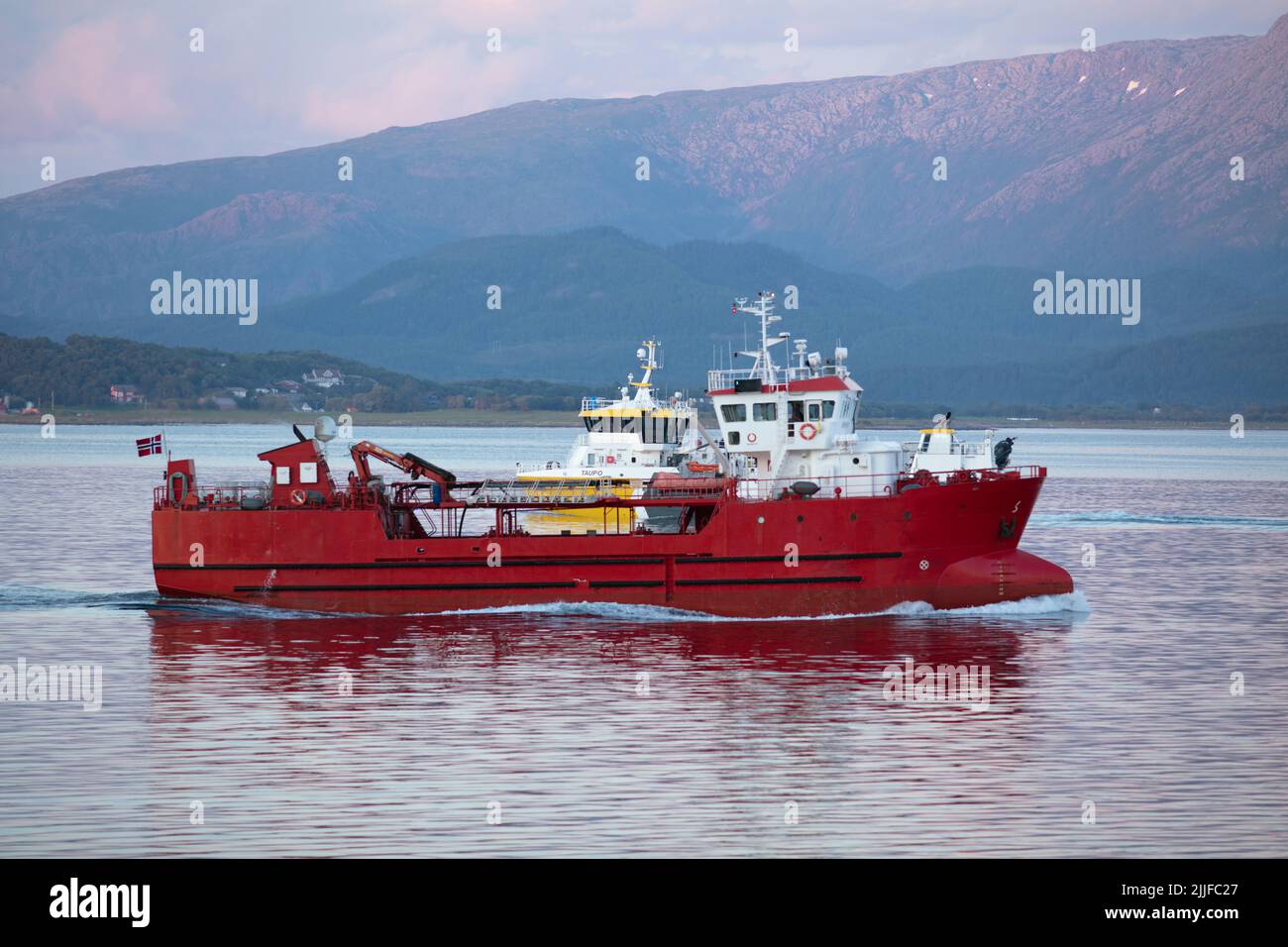 TORGHATTEN, NORWAY ON JUNE 30, 2022. The ships KYSTBUNKER and TAUPO ...