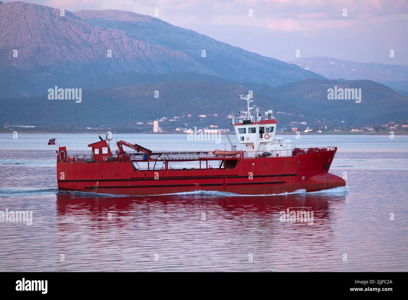 TORGHATTEN, NORWAY ON JUNE 30, 2022. The ship KYSTBUNKER passes the ...