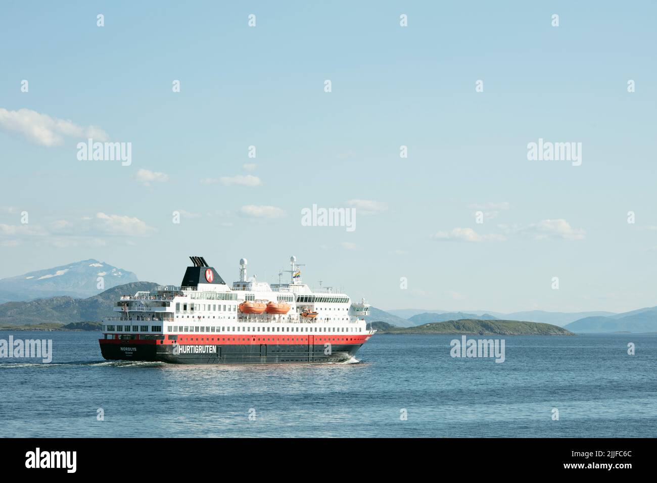 TORGHATTEN, NORWAY ON JUNE 30, 2022. The ship NORDLYS, HURTIGRUTEN ...