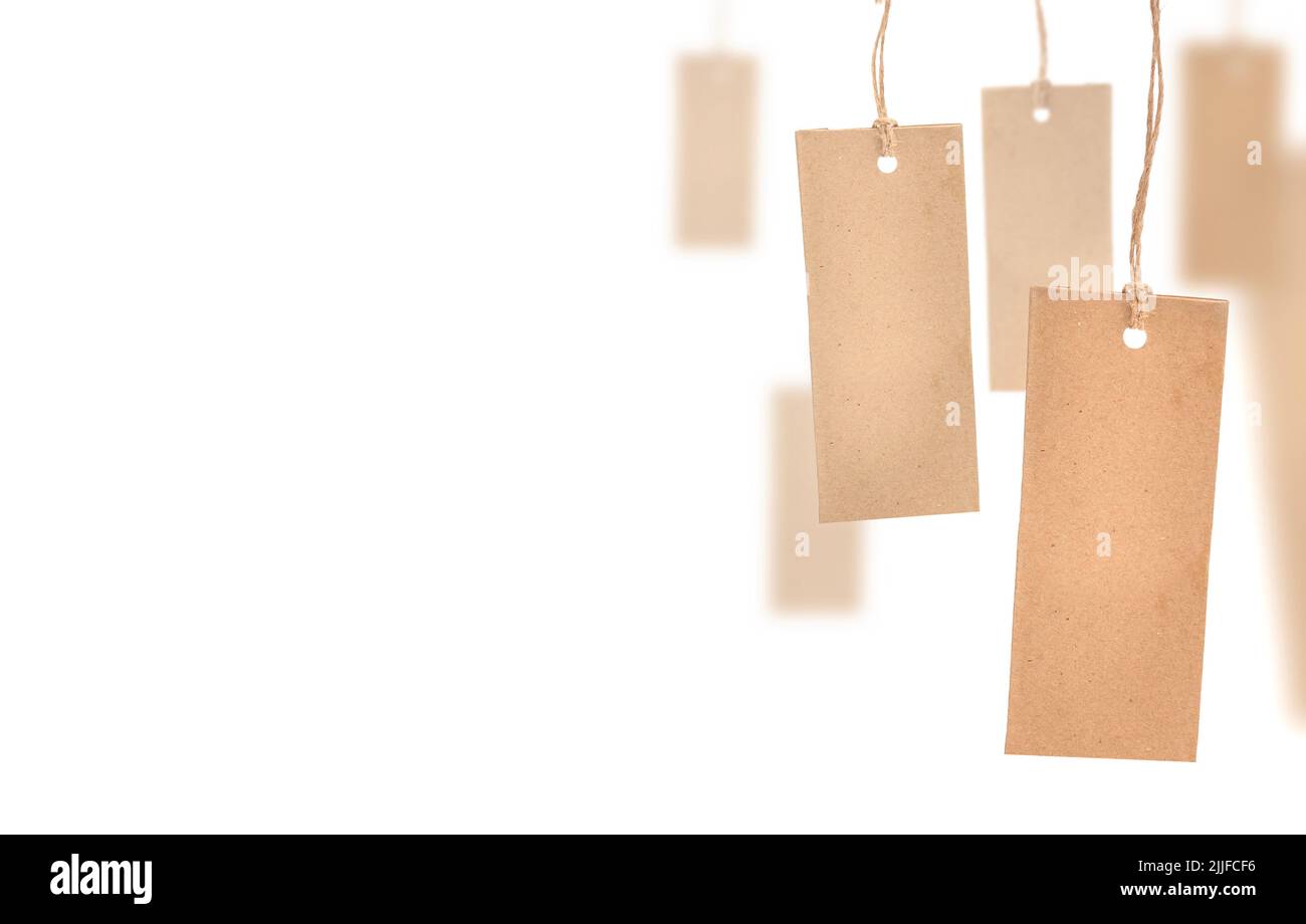 Cardboard price tags isolated on white background Stock Photo - Alamy