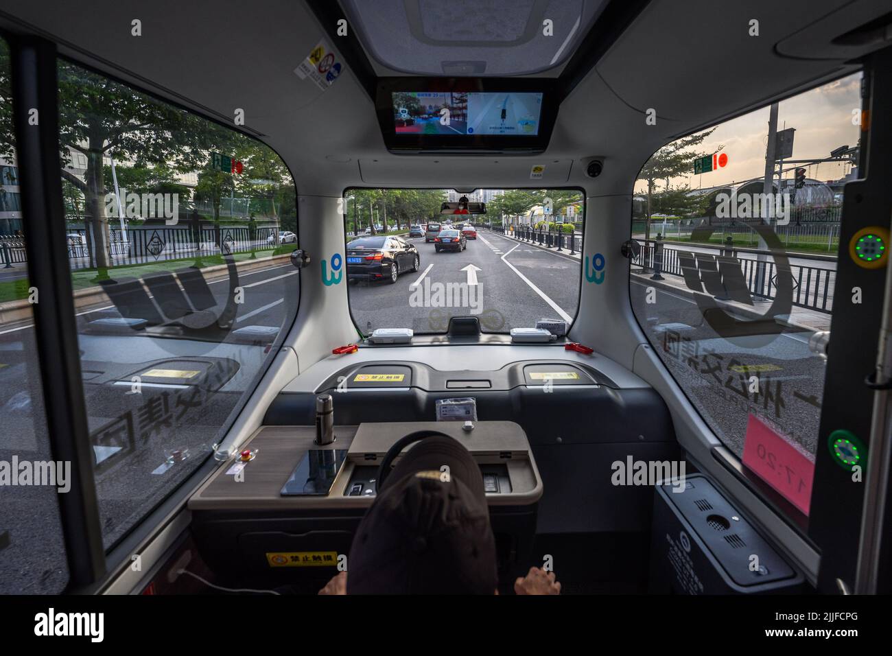 GUANGZHOU, CHINA - JULY 26, 2022 - Self-driving buses are seen during a ...