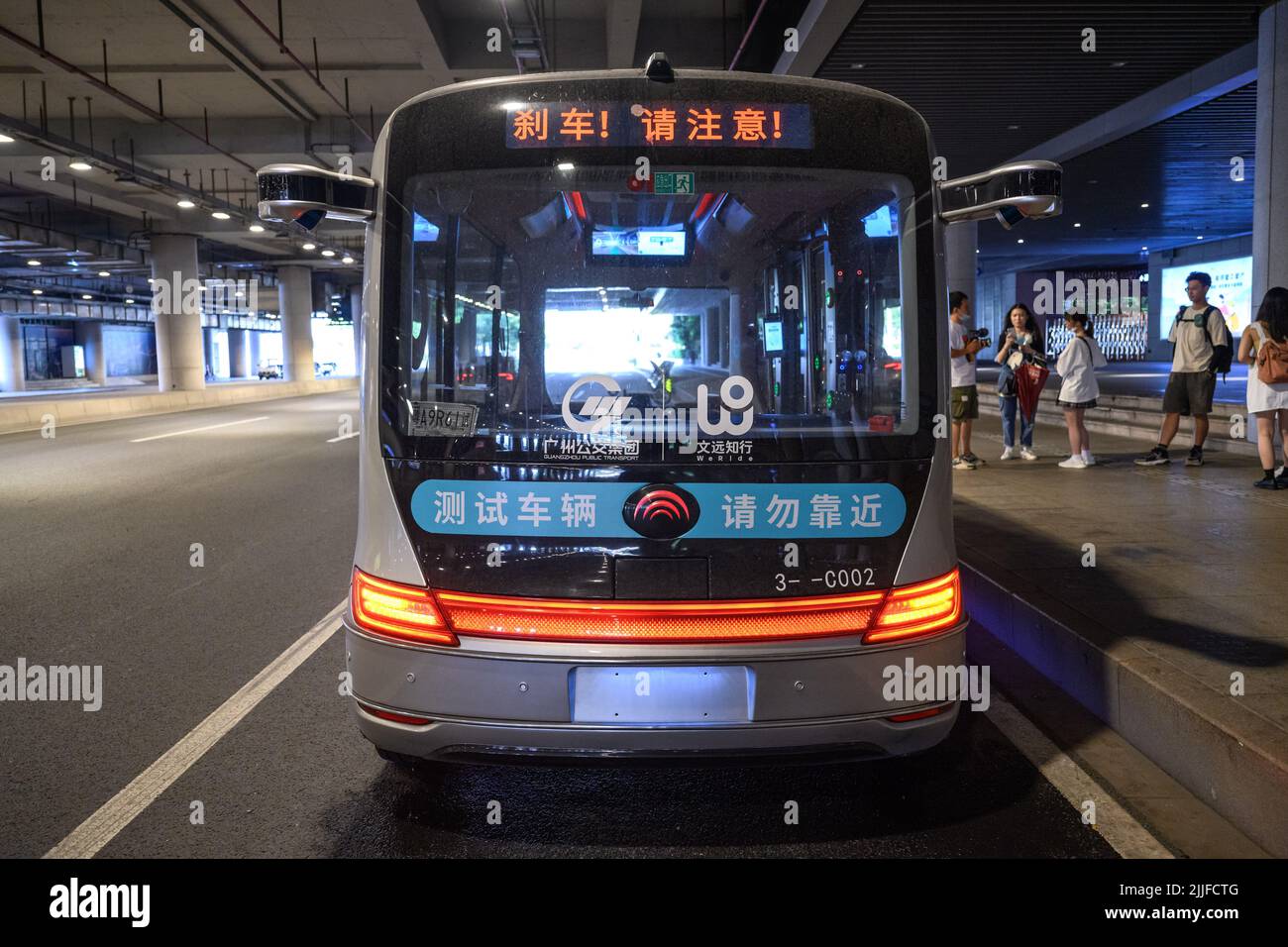 GUANGZHOU, CHINA - JULY 26, 2022 - Self-driving buses are seen during a ...