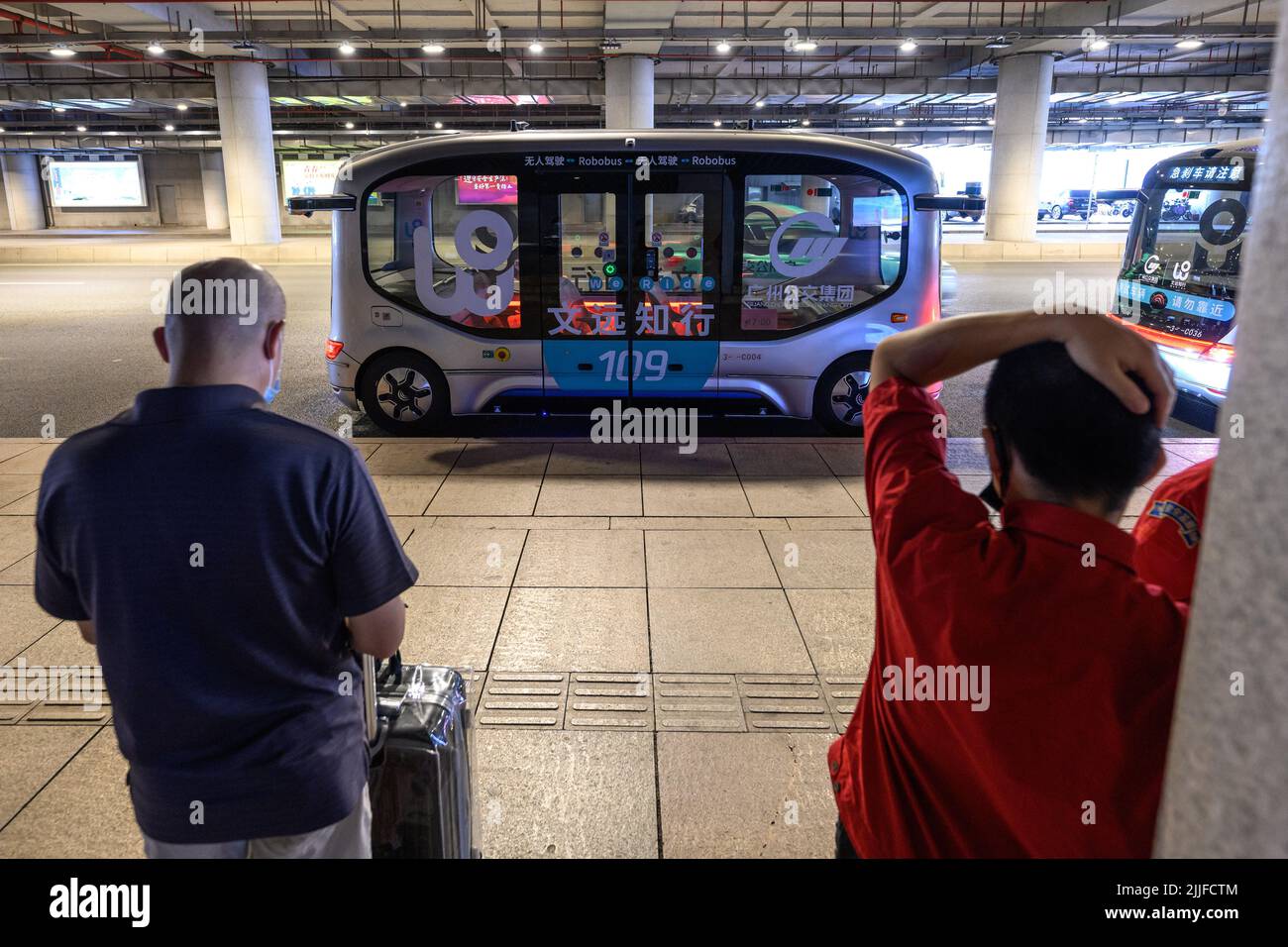 GUANGZHOU, CHINA - JULY 26, 2022 - Self-driving buses are seen during a ...