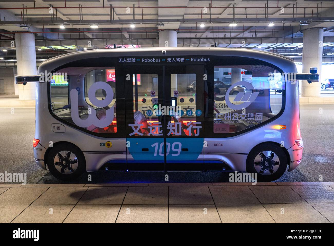 GUANGZHOU, CHINA - JULY 26, 2022 - Self-driving buses are seen during a ...
