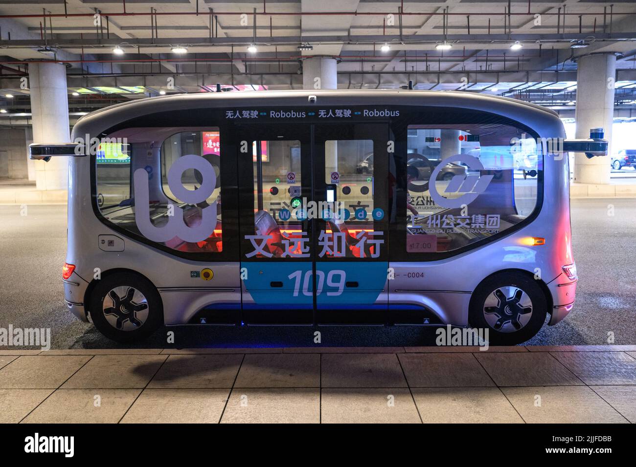 GUANGZHOU, CHINA - JULY 26, 2022 - Self-driving buses are seen during a ...
