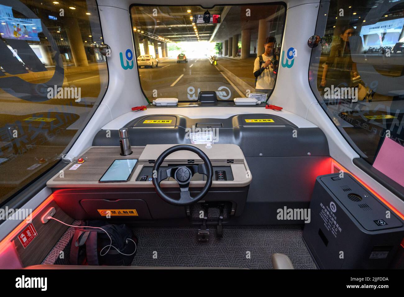 GUANGZHOU, CHINA - JULY 26, 2022 - Self-driving buses are seen during a ...