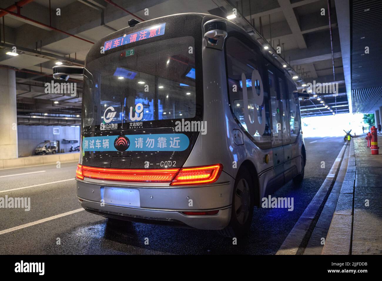 GUANGZHOU, CHINA - JULY 26, 2022 - Self-driving buses are seen during a ...