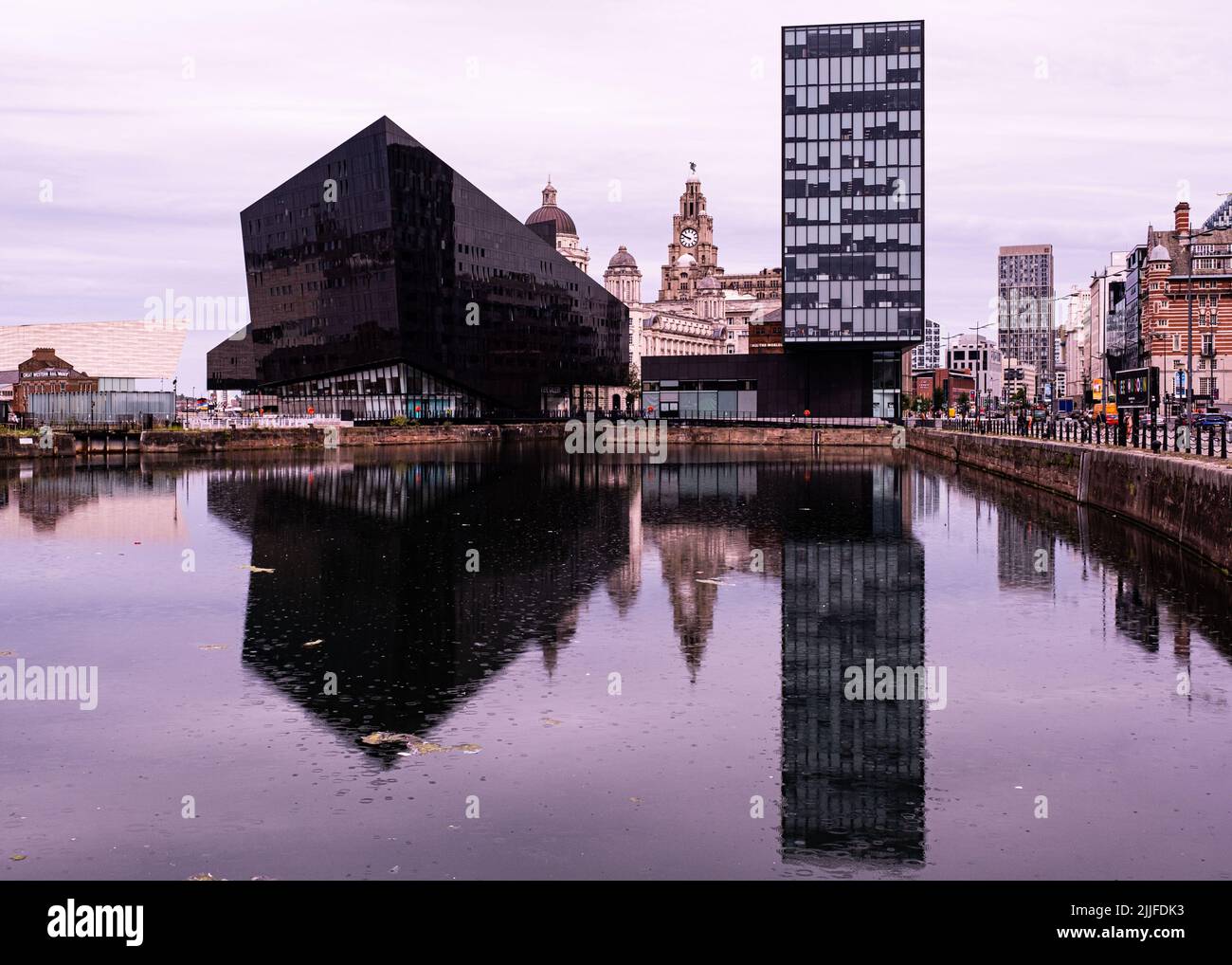 Commercial development, seen reflected in water, from Albert Dock ...