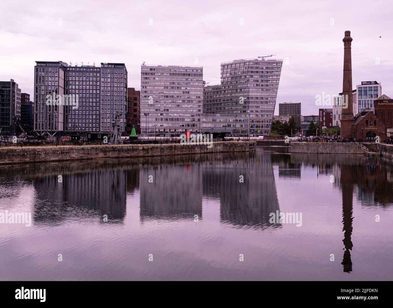 Commercial development, seen reflected in water, from Albert Dock ...