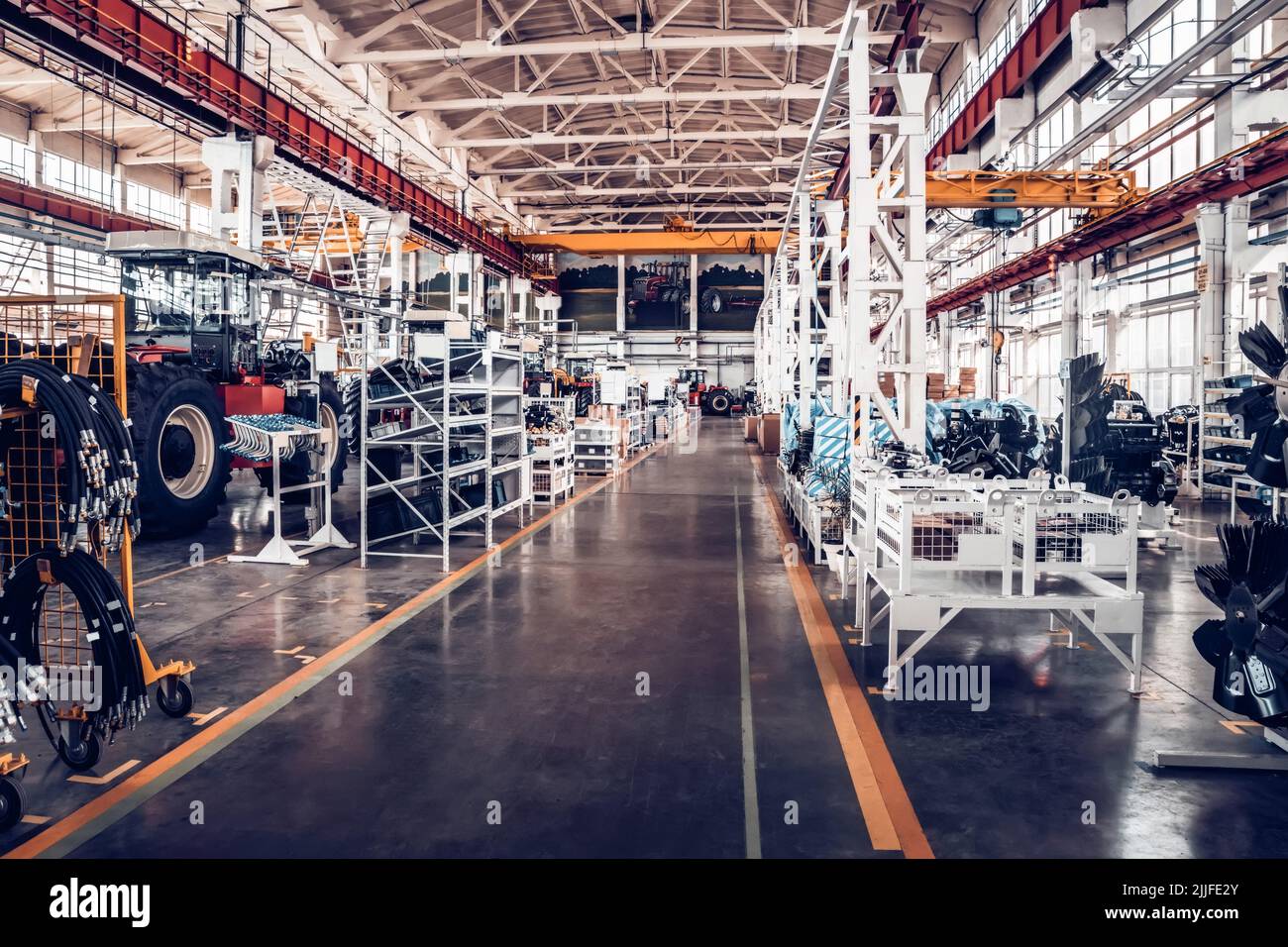Assembly room at big industrial plant manufacturing tractors and ...