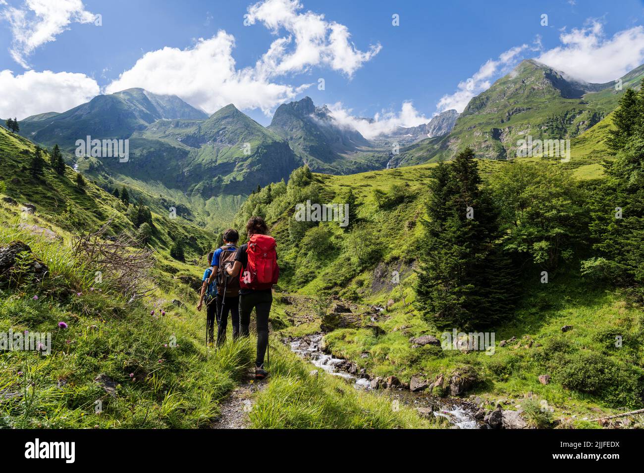 hikers on the trail, Ascending towards Hourgade Peak, L´Ourtiga, Luchon ...