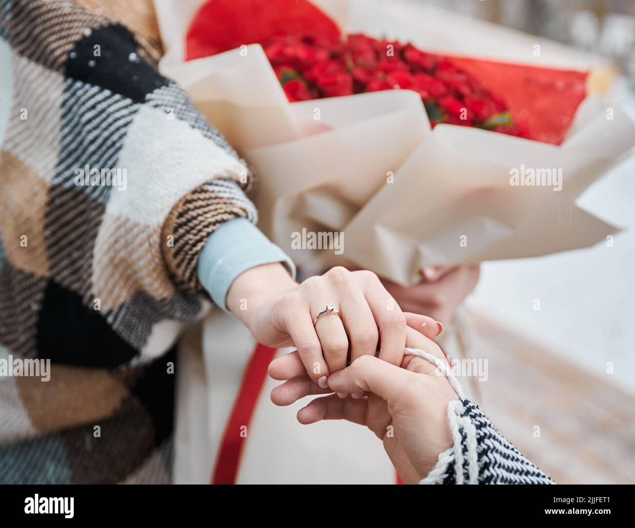 Happy couple holding flower hi-res stock photography and images - Alamy