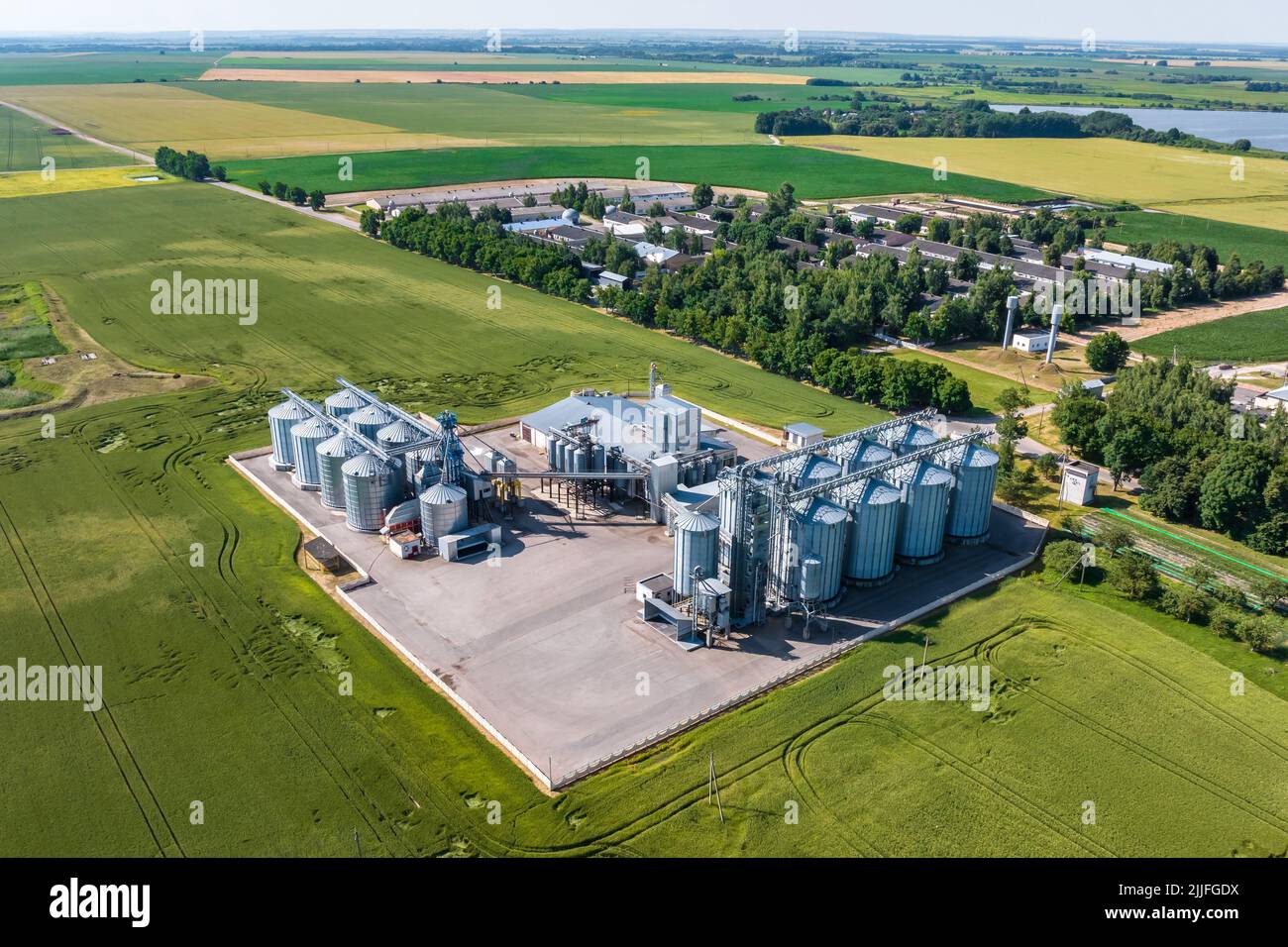 aerial view on agro silos granary elevator with seeds cleaning line on ...