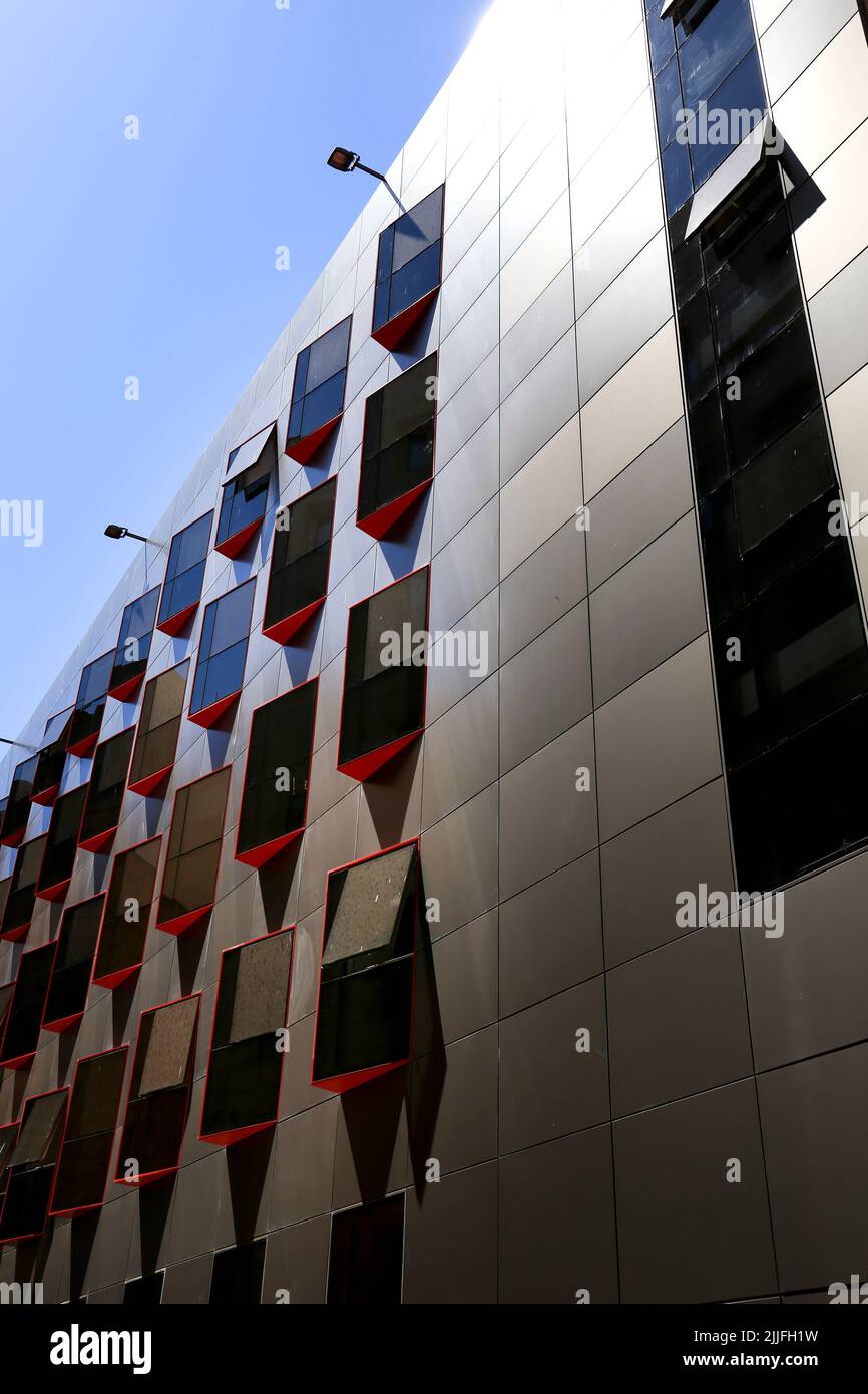 Rectilinear and geometric facade with glass windows of the Town Hall of ...