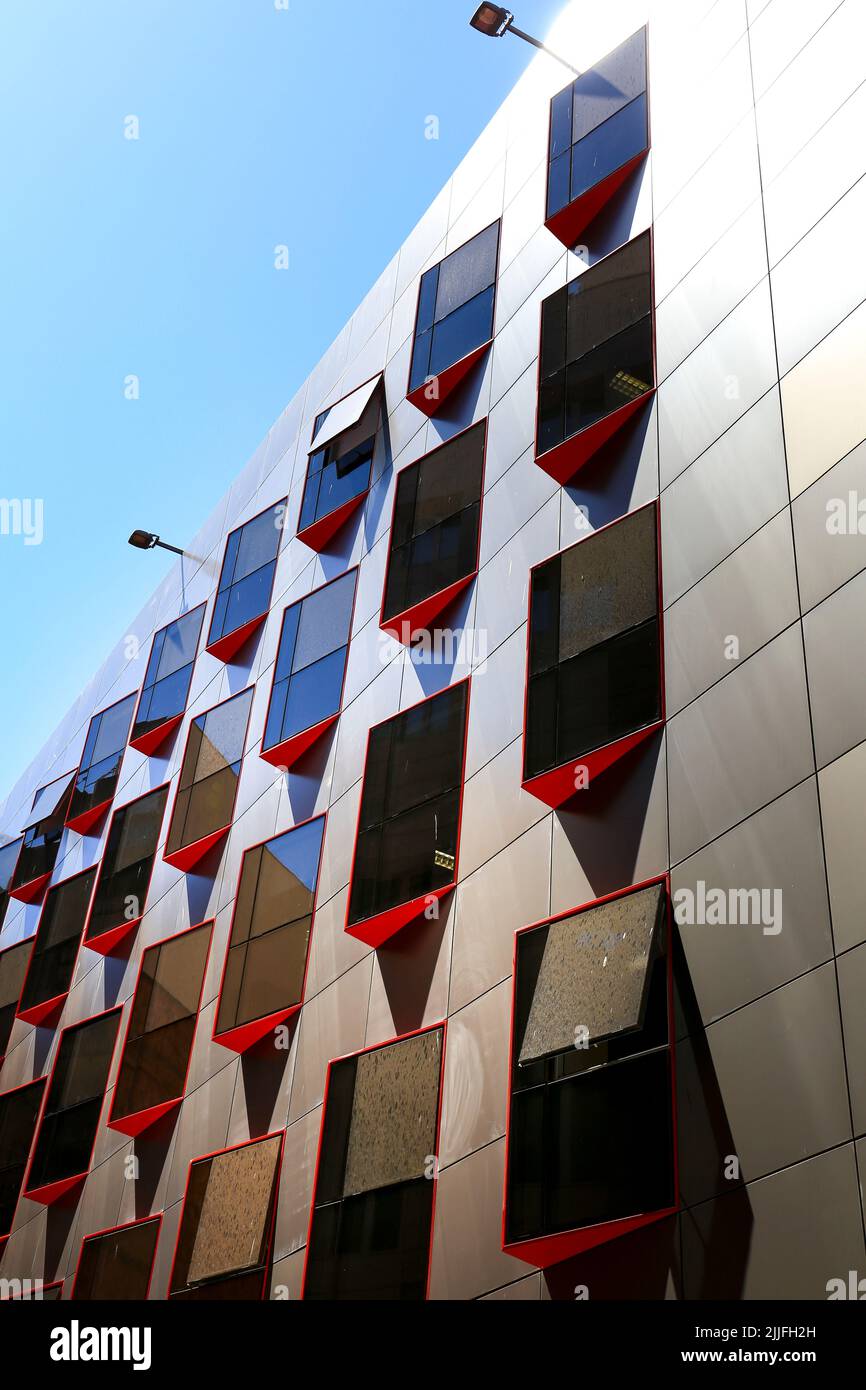 Rectilinear and geometric facade with glass windows of the Town Hall of ...