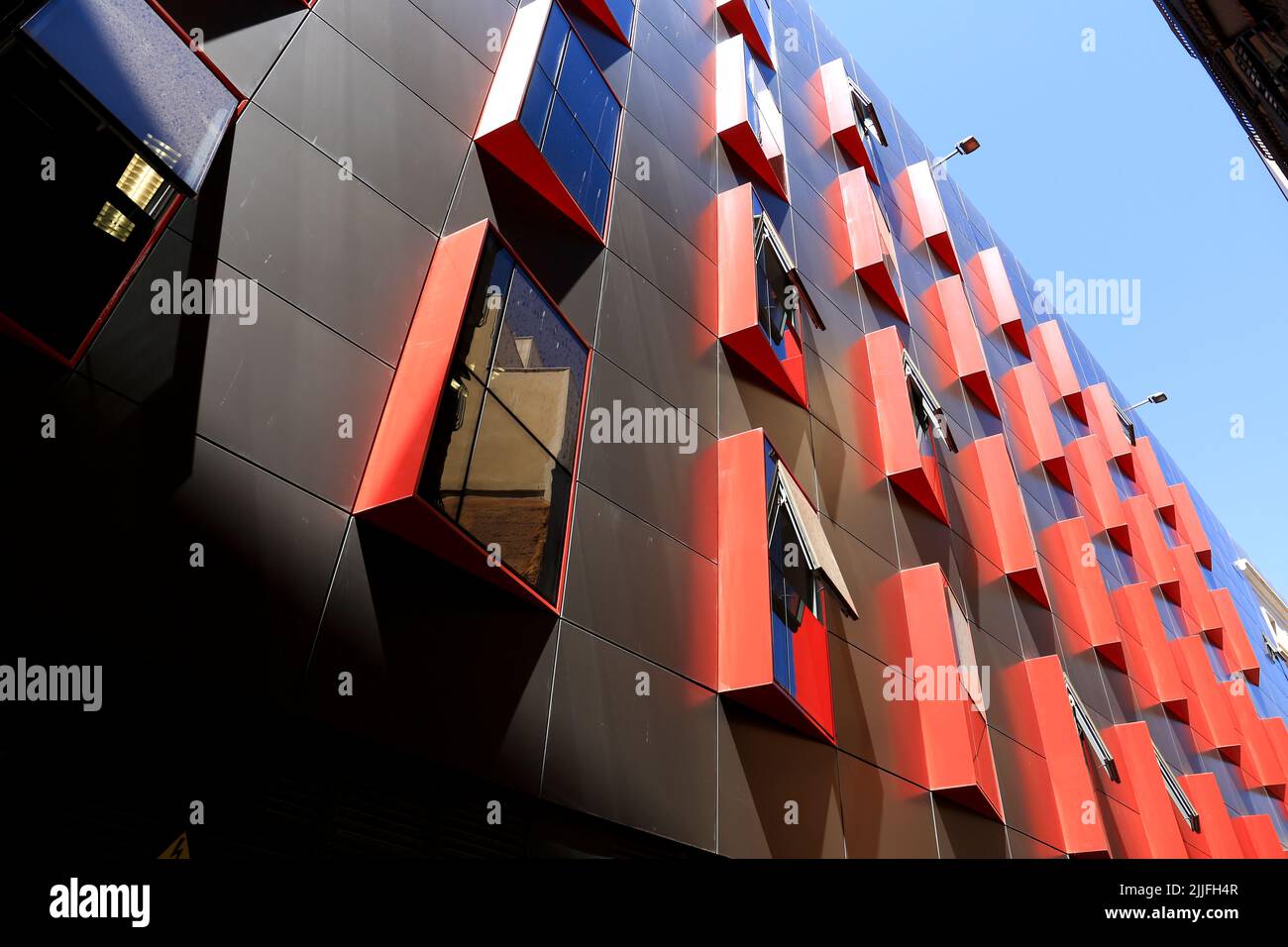 Rectilinear and geometric facade with glass windows of the Town Hall of ...