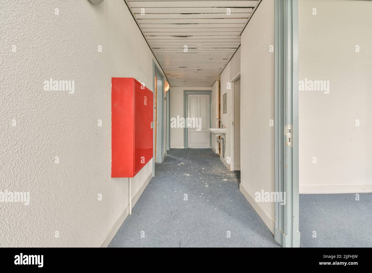 Interior of modern flat in minimal style with narrow empty corridor ...