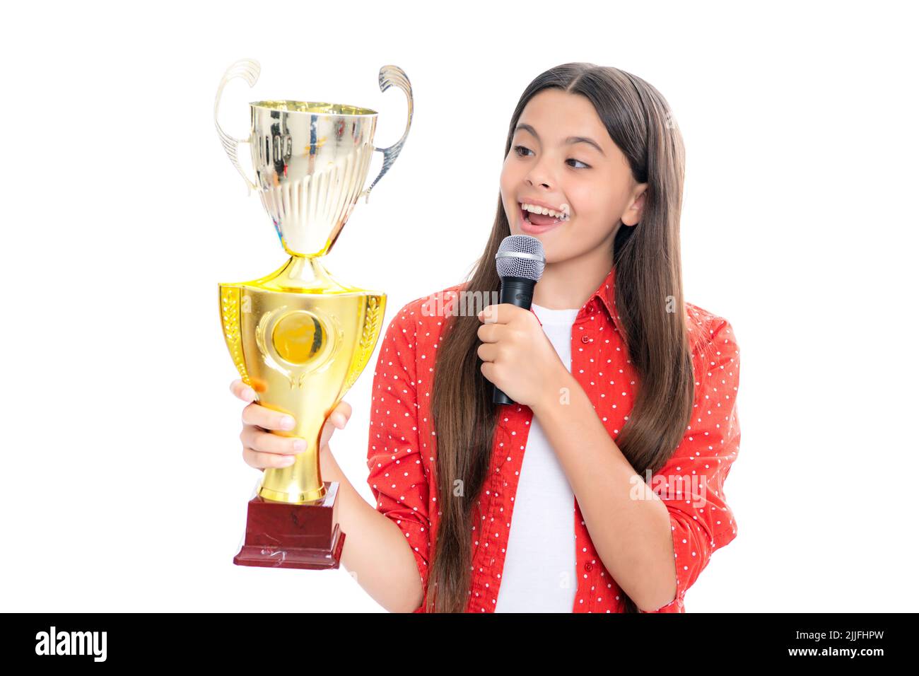 Teenager girl with win cup. Teen holding a trophy microphone speech ...