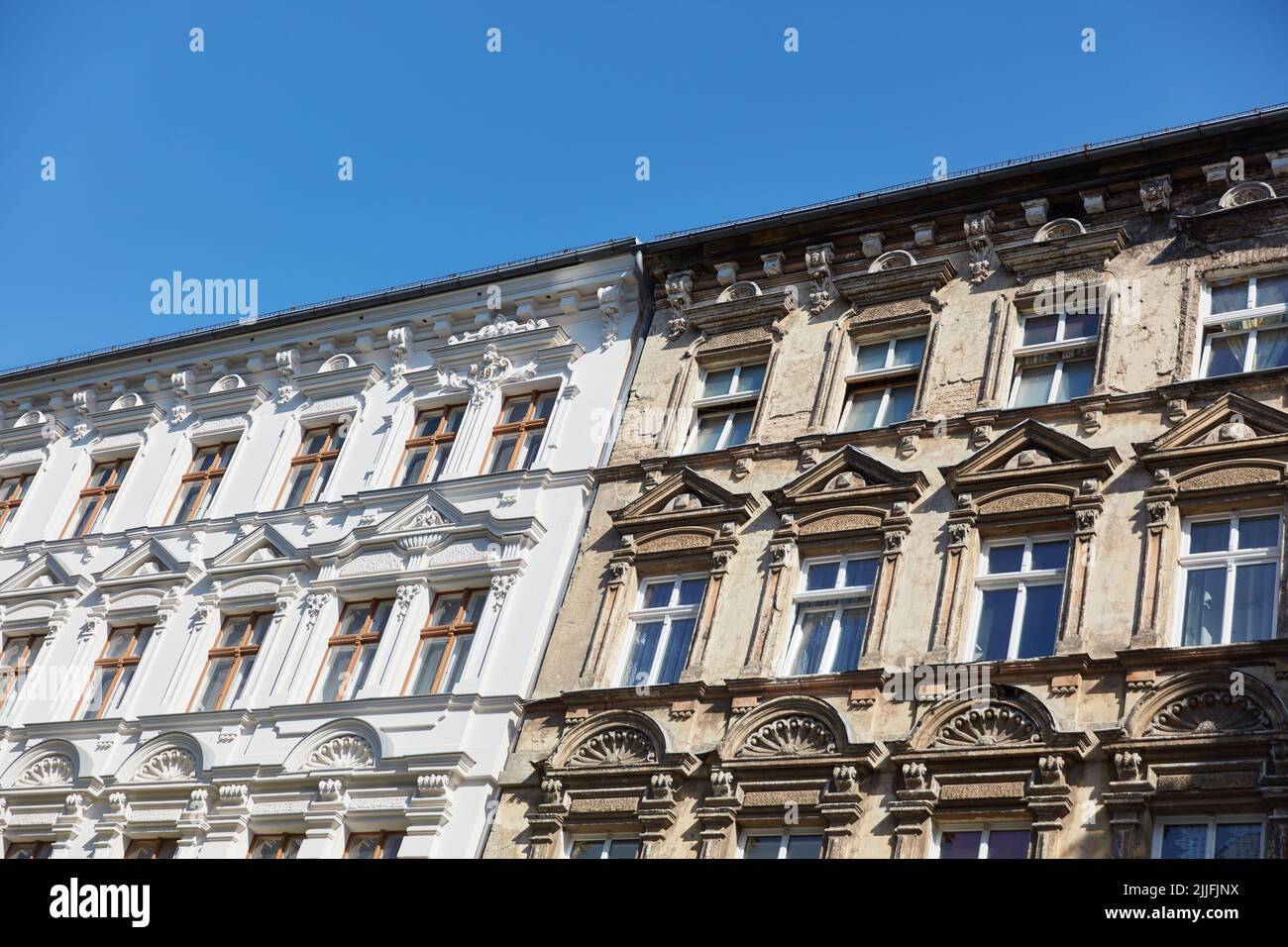 Renovation and insulation of old building facade before and after Stock ...