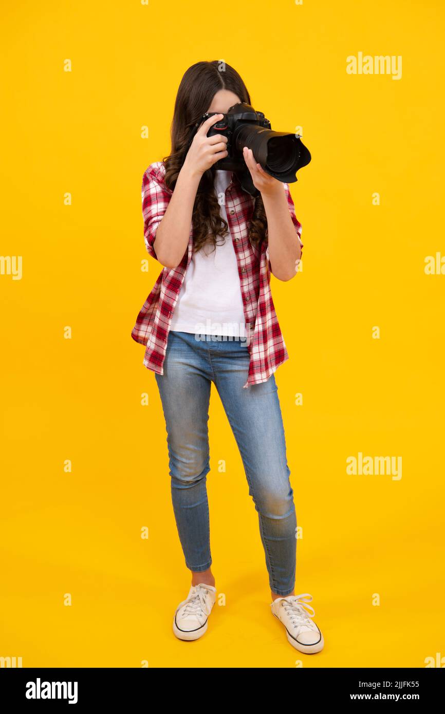 Teenage girl photographing with dslr camera hi-res stock photography ...