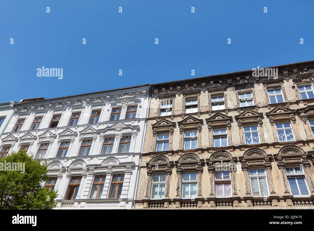 Apartment building in an old building with old and new facades before ...