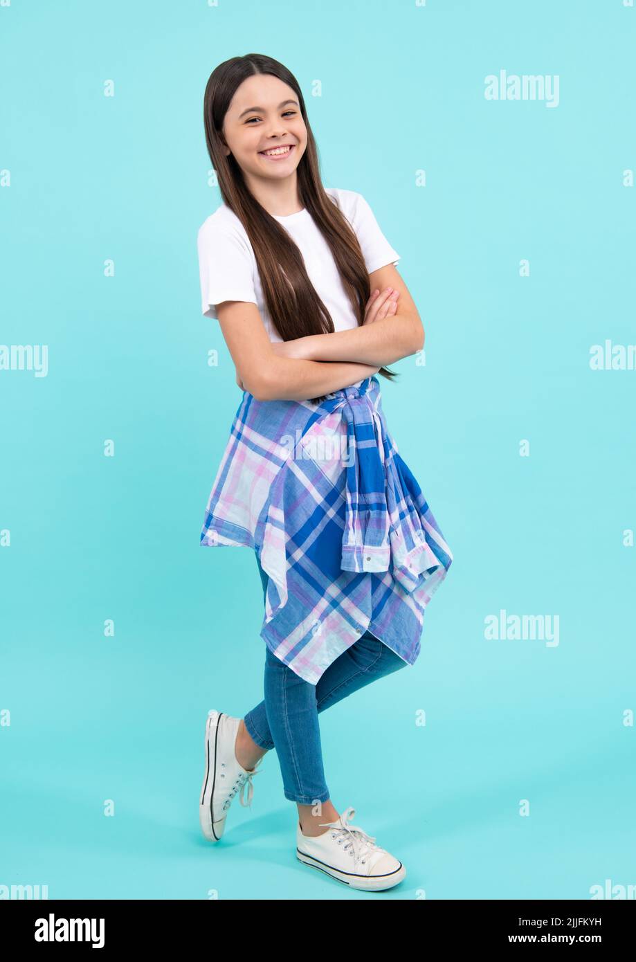 Full length photo of pretty teenager child girl wear casual clothes ...