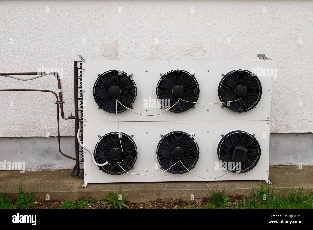 Condensing unit of air conditioning systems outside the building. Heat ...