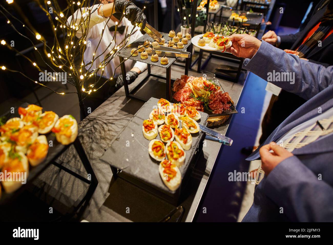 buffet during a business event, people take their own food Stock Photo ...