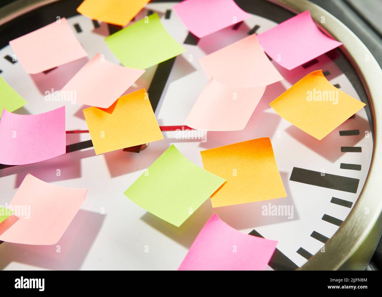 Post It notes covering clock Stock Photo - Alamy
