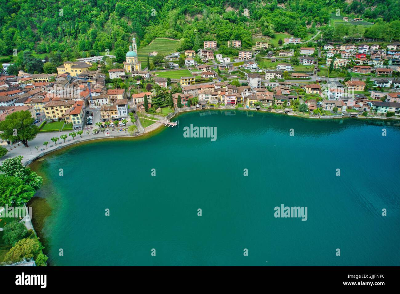 An aerial view of the lake of Riva San Vitale in Ticino, Switzerland ...