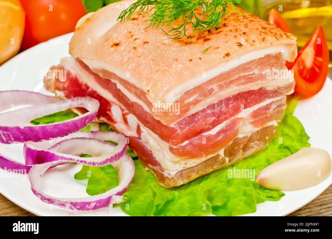 Juicy appetizing piece of pork belly. Salo with meat layer Stock Photo ...