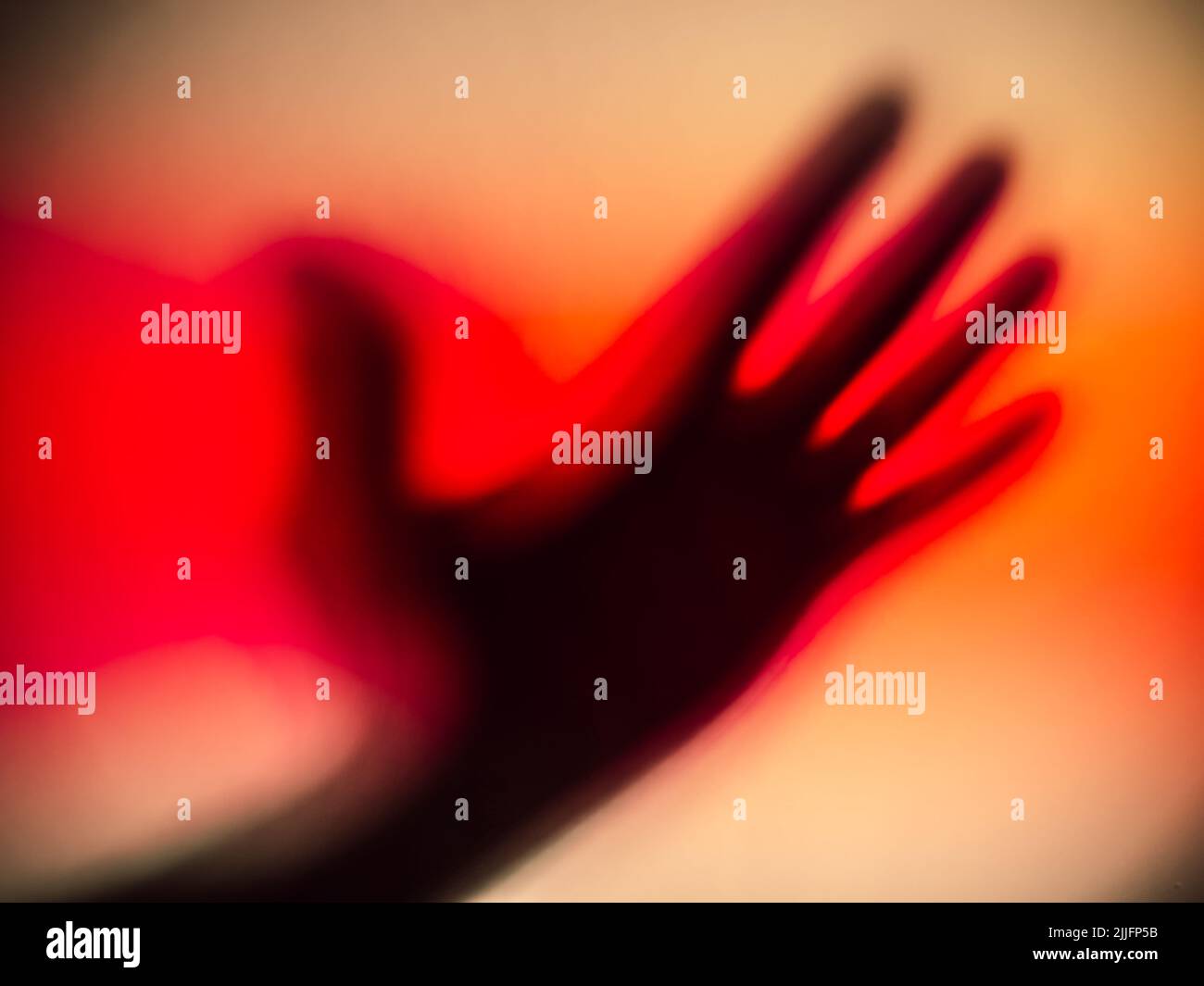 A bloody shadow of a silhouetted hand Stock Photo - Alamy