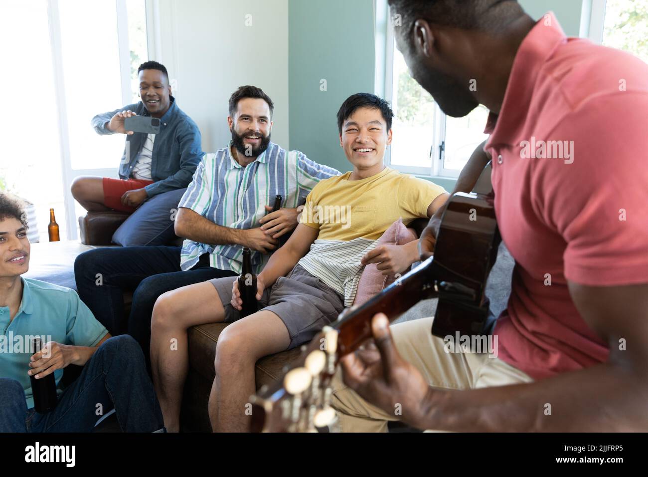 Happy male friends hi-res stock photography and images - Alamy