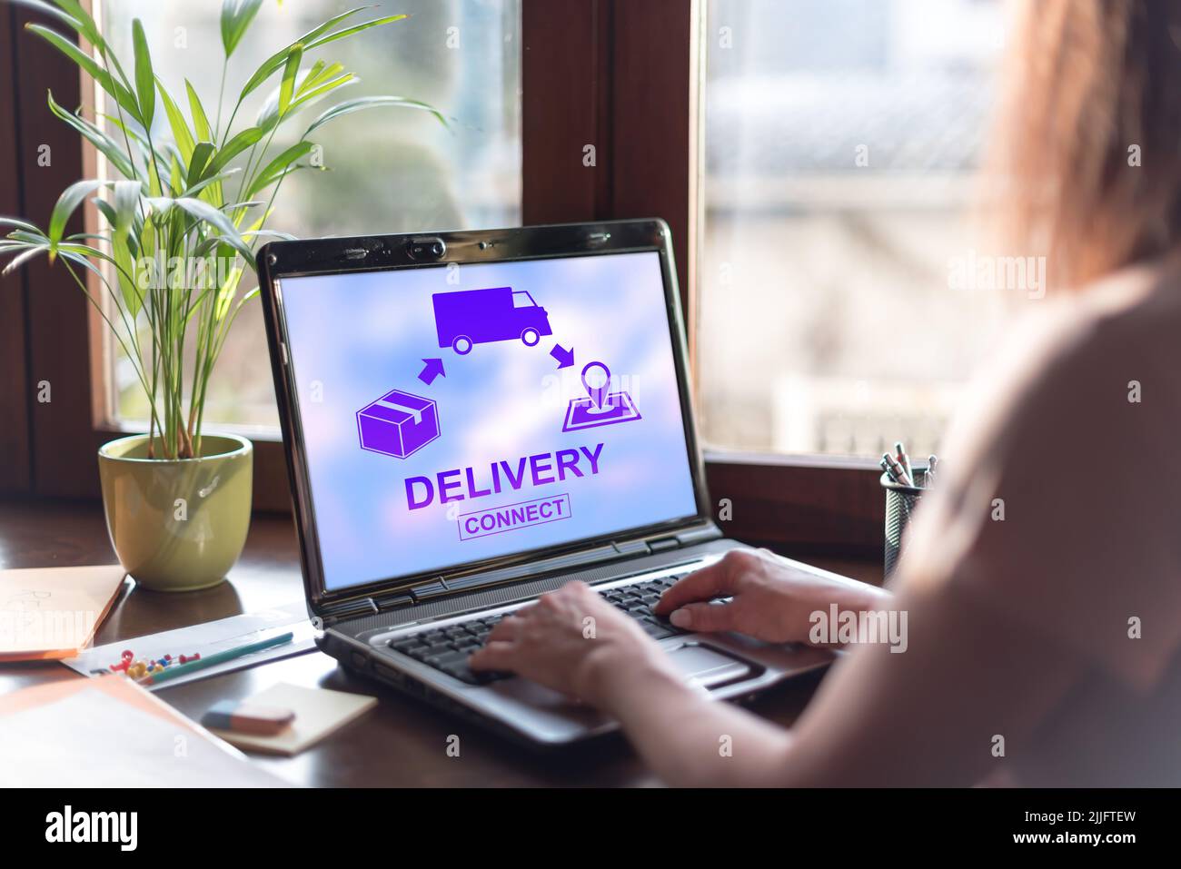 Laptop screen displaying a delivery concept Stock Photo - Alamy