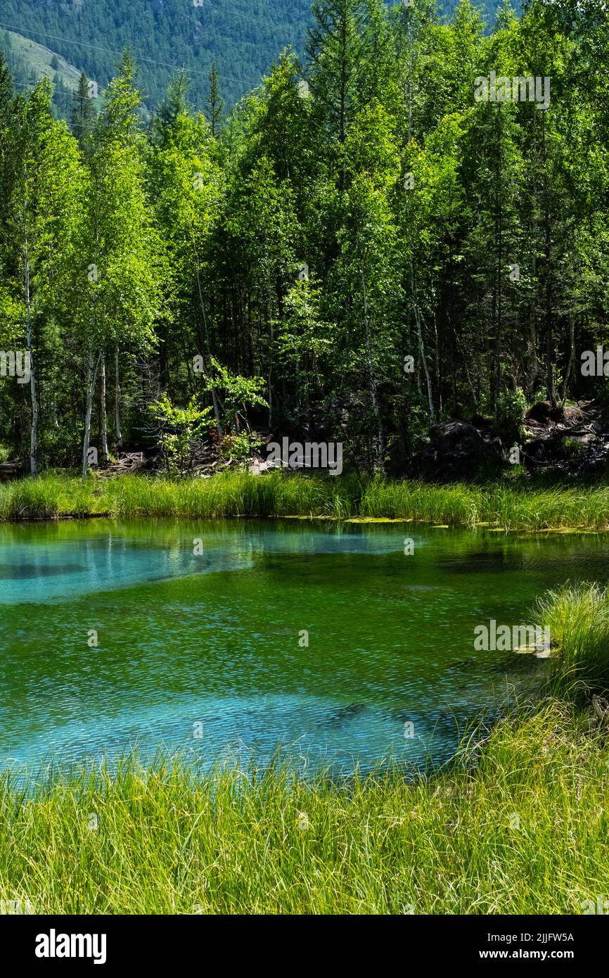 Geyser lake with turquoise thermal springs, close up. Fairytale ...