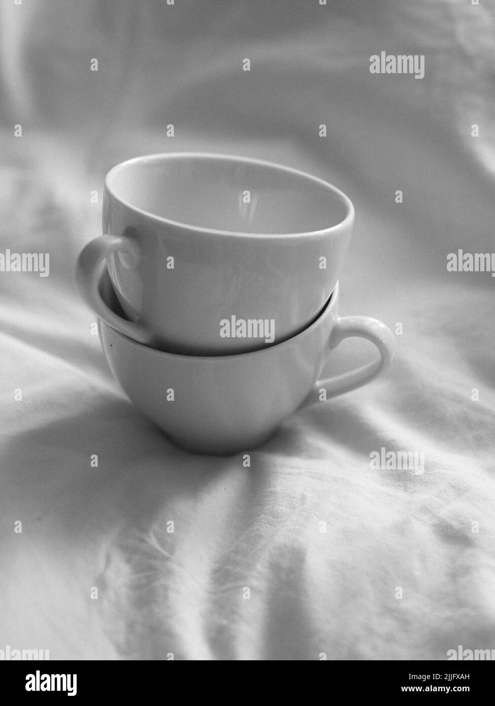 White cup coffee light Black and White Stock Photos & Images - Alamy