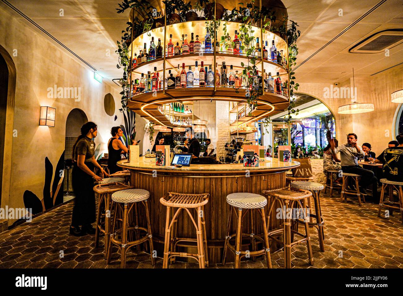 The Nightlife at Merci Marcel Orchard Dinner Stock Photo - Alamy
