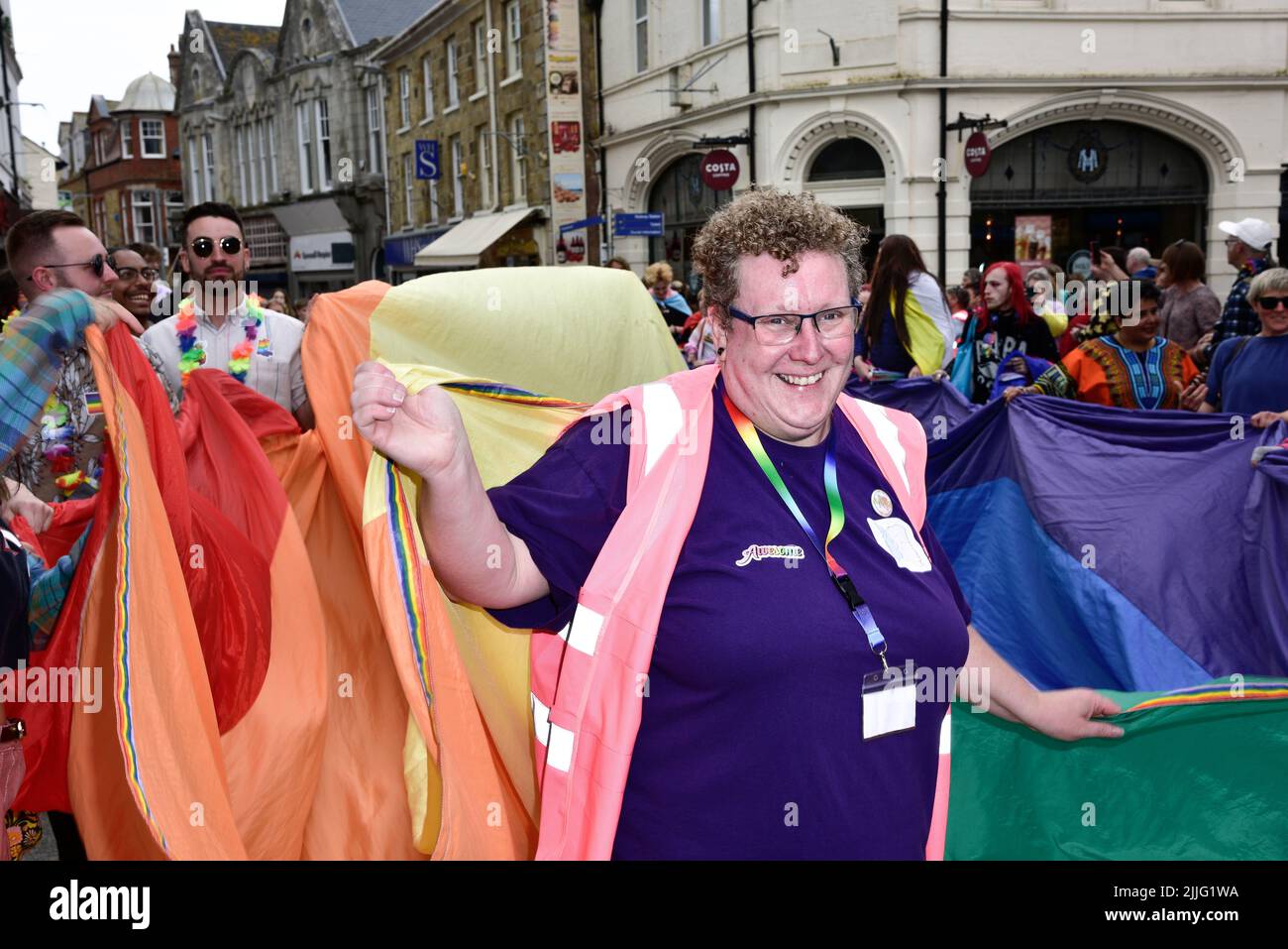 The vibrant colourful Cornwall Prides Pride parade in Newquay Town centre in the UK Stock Photo ...