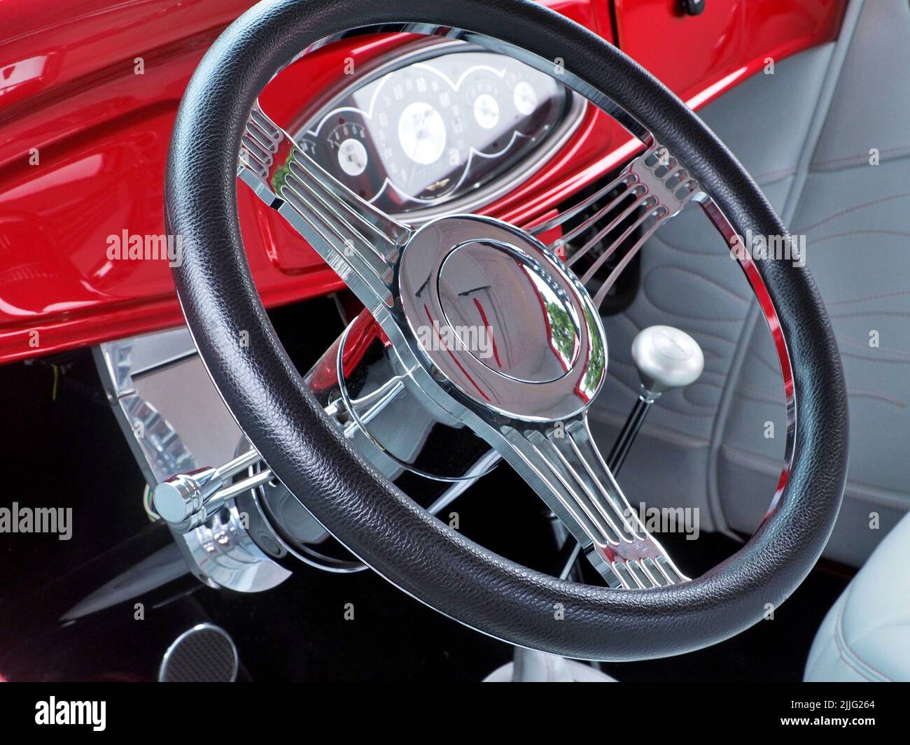 A closeup of a steering wheel detail of a classic car Stock Photo - Alamy