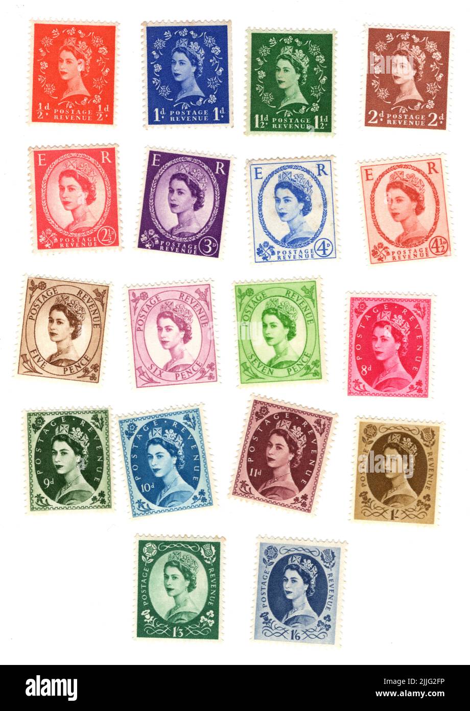 A selection of Elizabeth II vintage postage stamps on a white ...