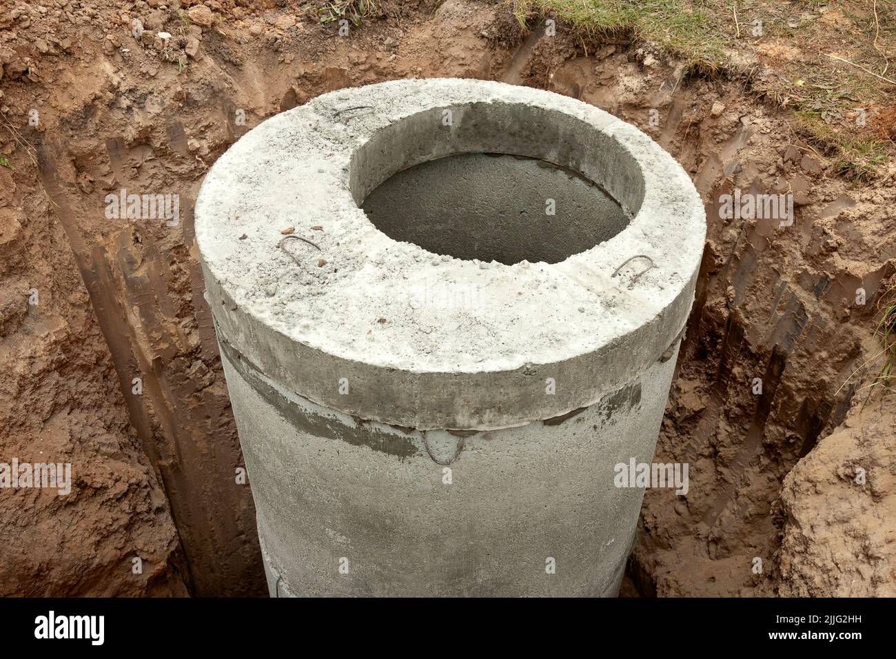 Installation of underground tank for sewage system Stock Photo - Alamy
