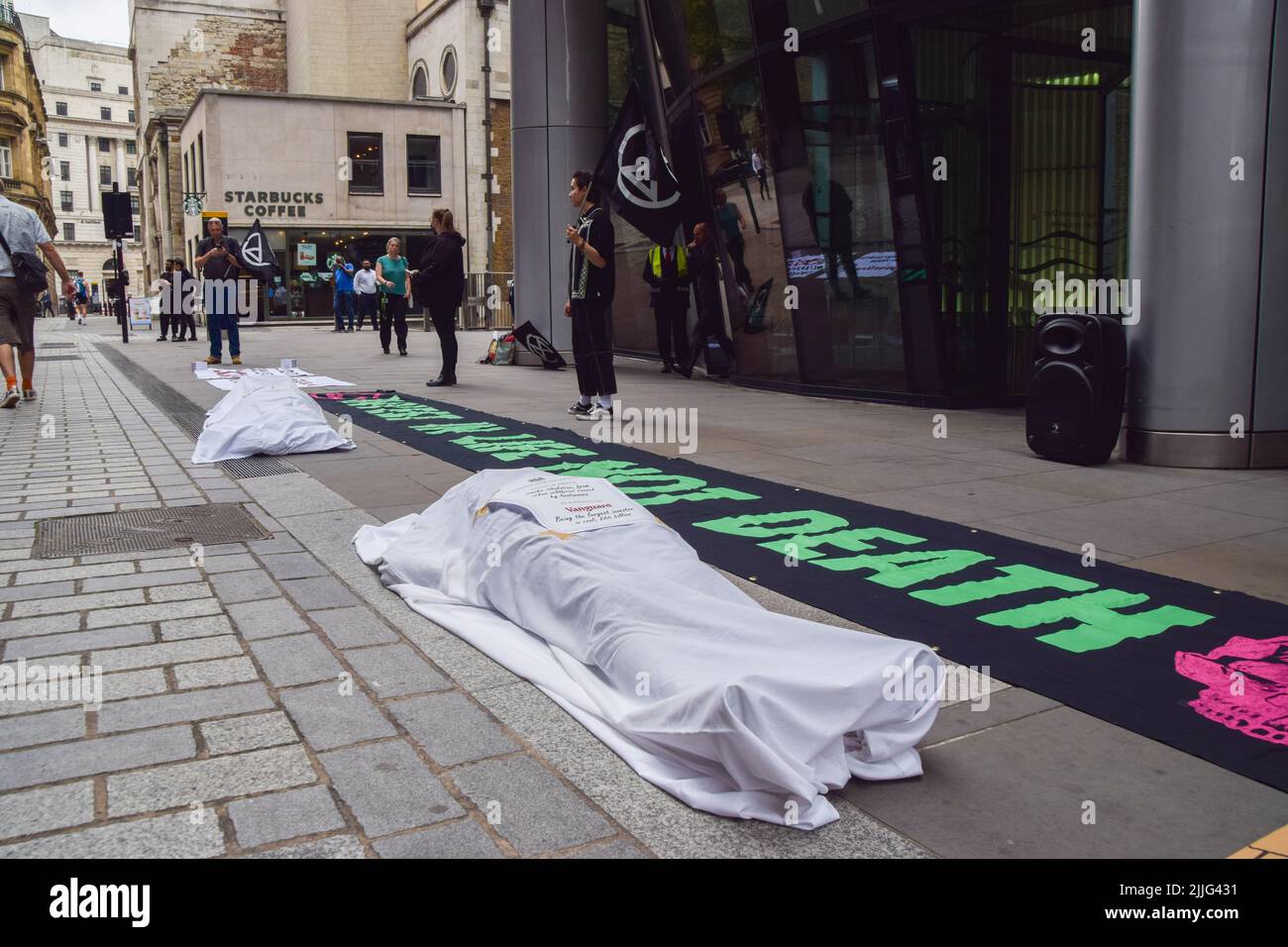 Dead bodies covered by white sheets hi-res stock photography and images ...