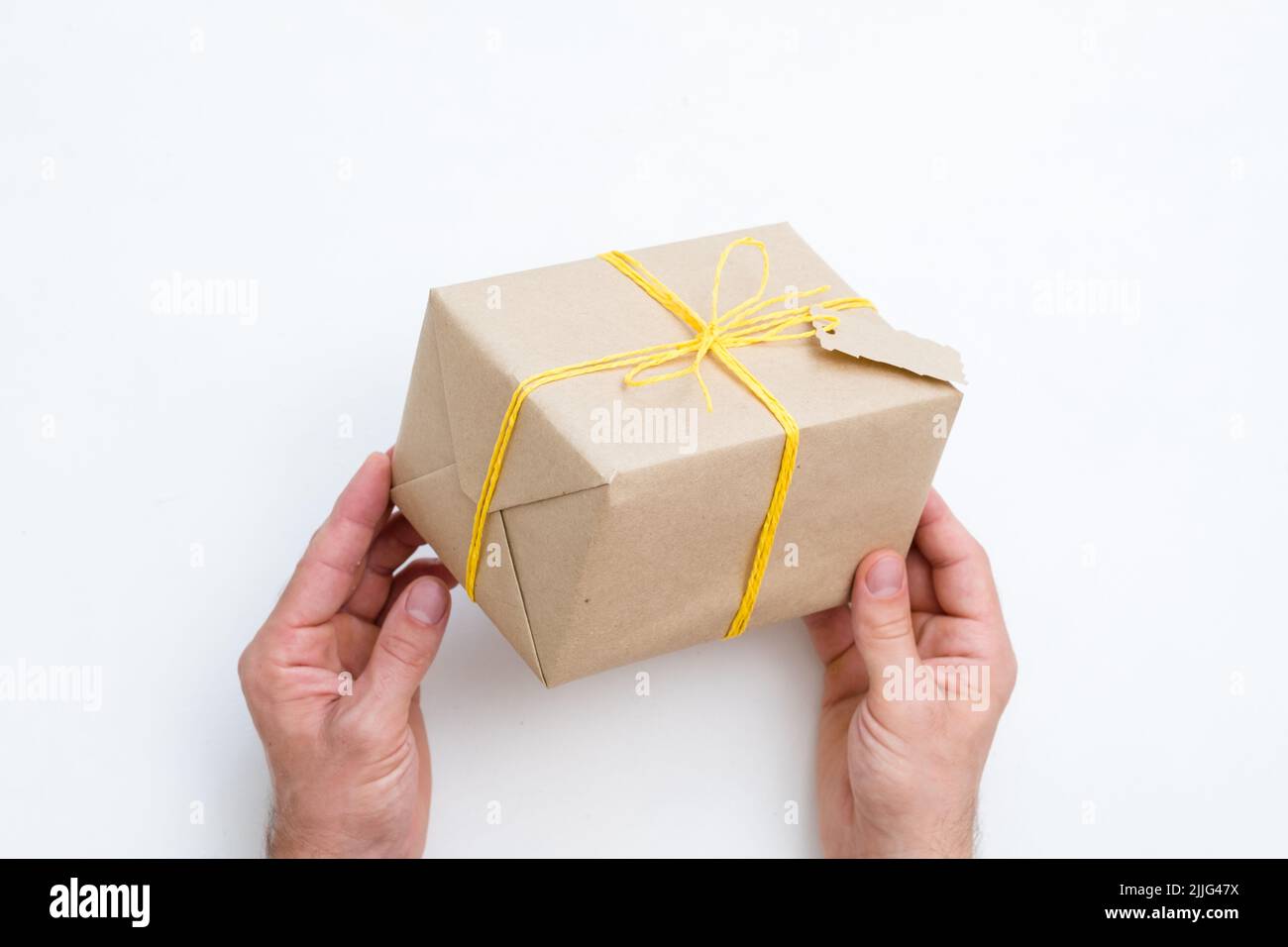 handcrafted present congratulation hands hold gift Stock Photo - Alamy