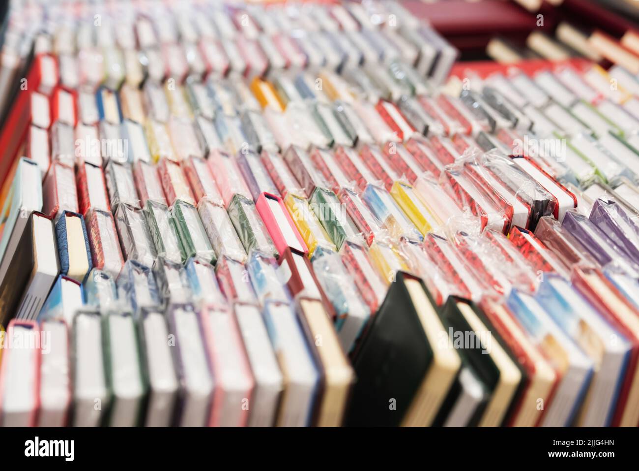 variety of notebooks in stationery shop on blurred background Stock ...
