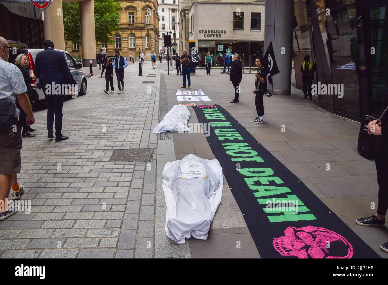 Dead bodies covered by white sheets hi-res stock photography and images ...
